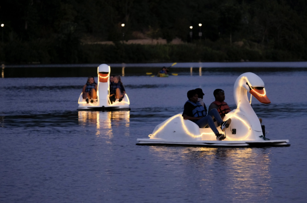 Swan boats light up the night at Como Lake | Wheel Fun Rentals